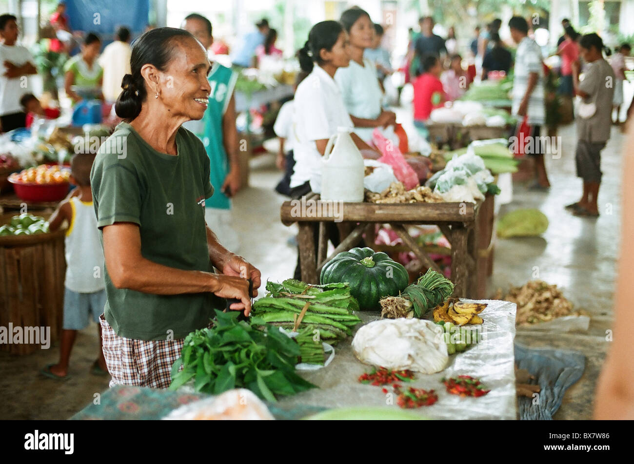 Photo is taken in philippines, local market with lots of products. A ...