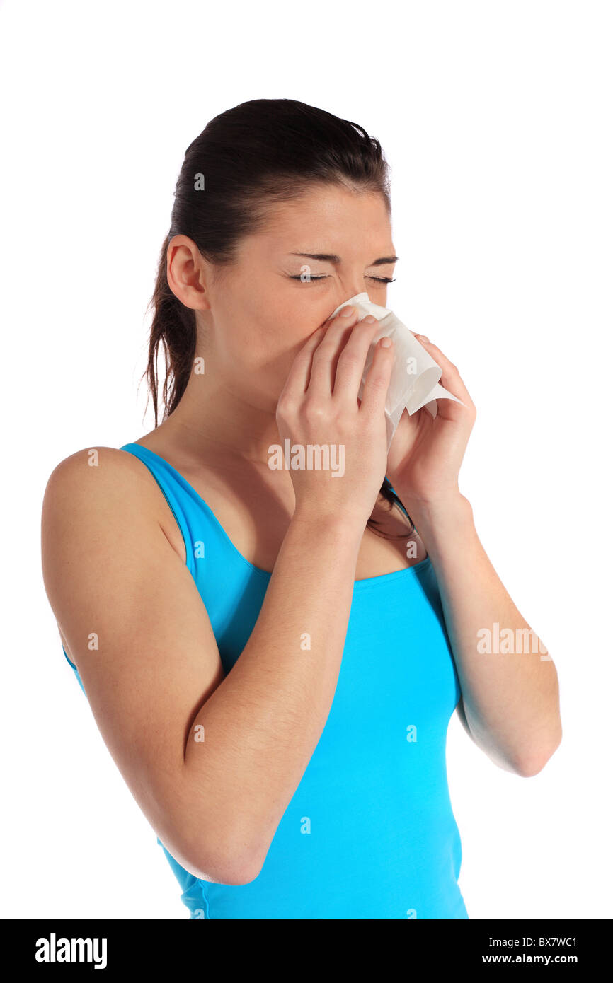 Attractive young woman using a tissue. All on white background Stock ...