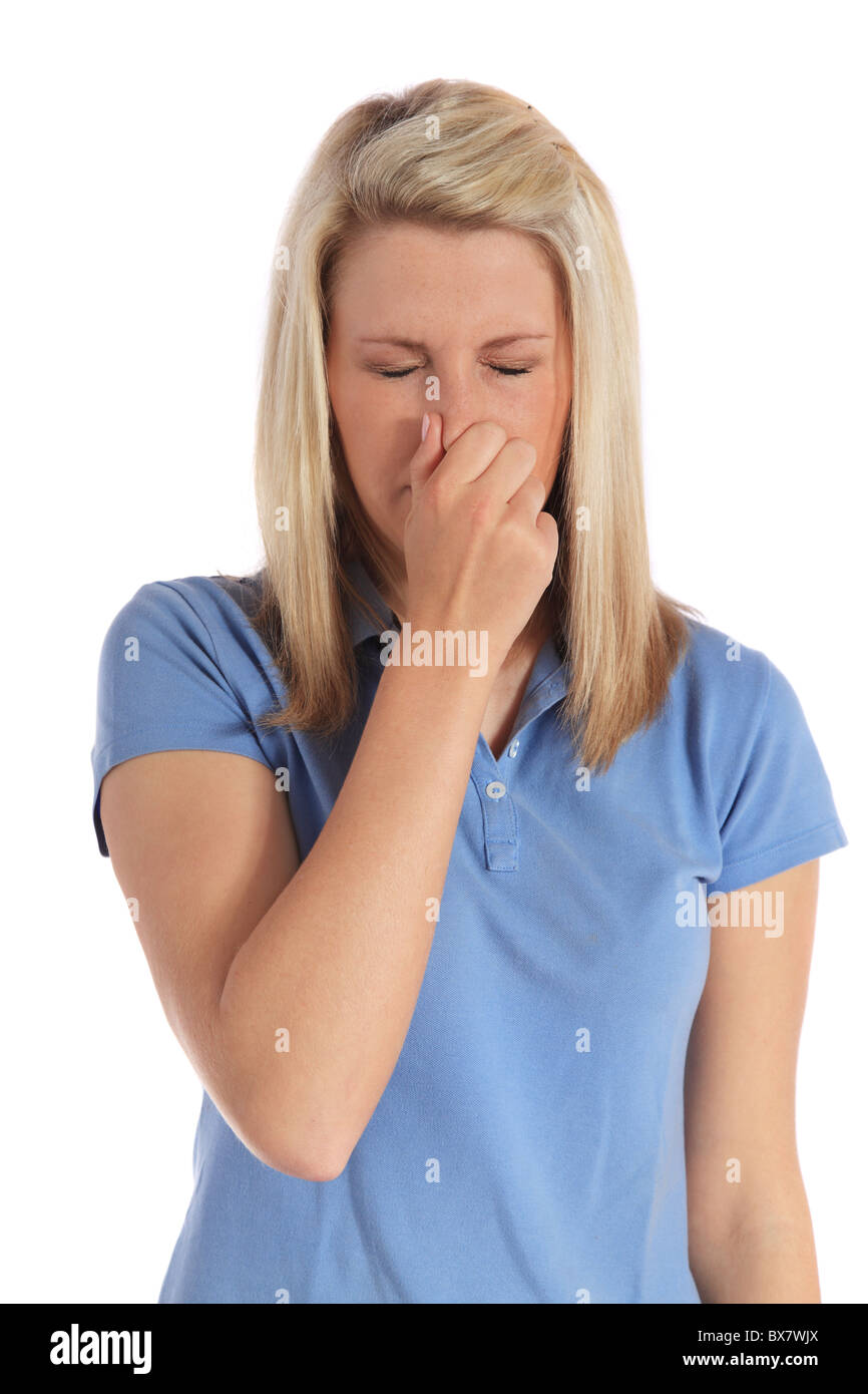 An attractive young woman sneezing. All on white background Stock Photo ...