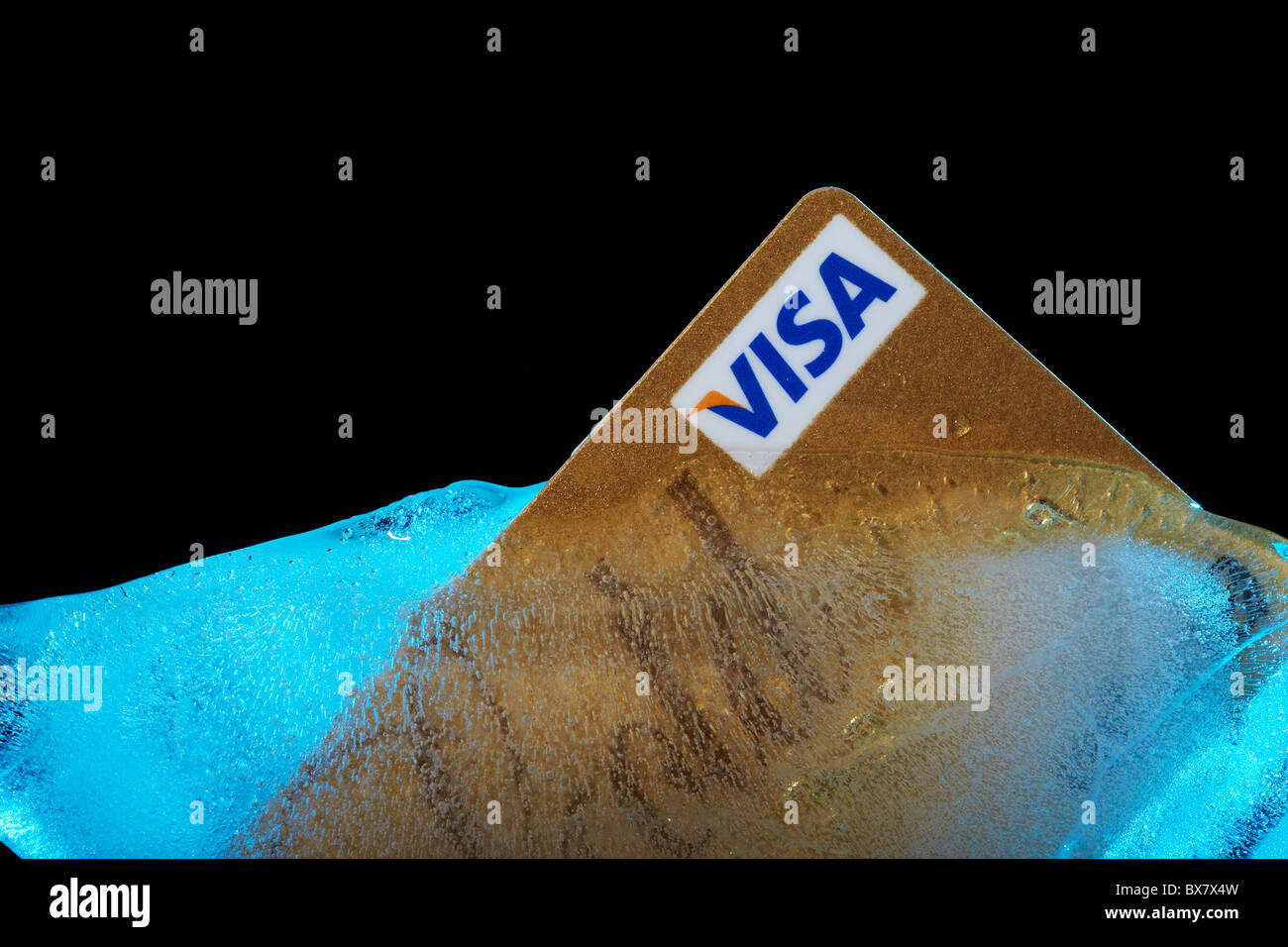 Credit Card frozen in Ice, representing 'credit freeze' Stock Photo - Alamy