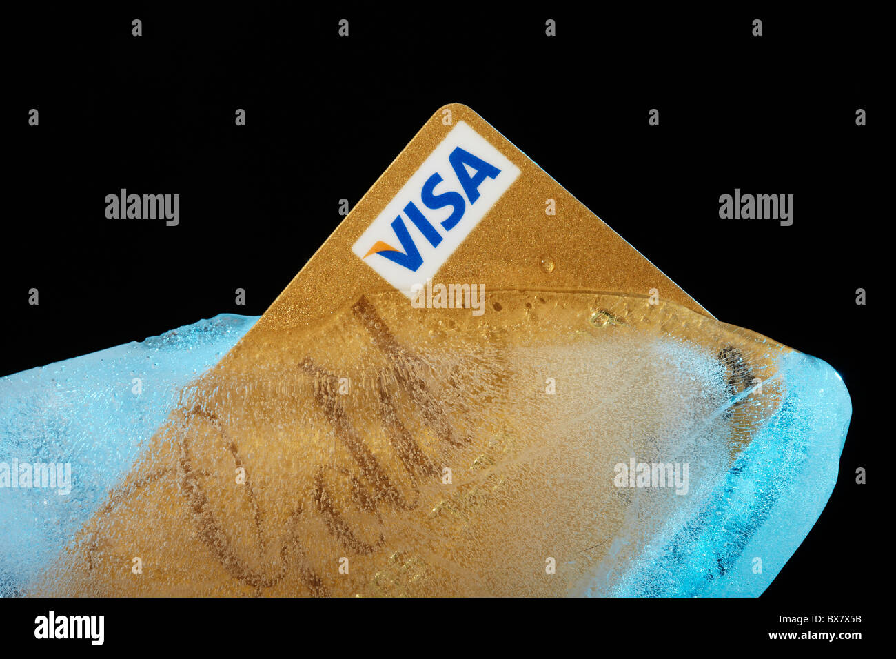 Credit Card frozen in Ice, representing 'credit freeze' Stock Photo - Alamy