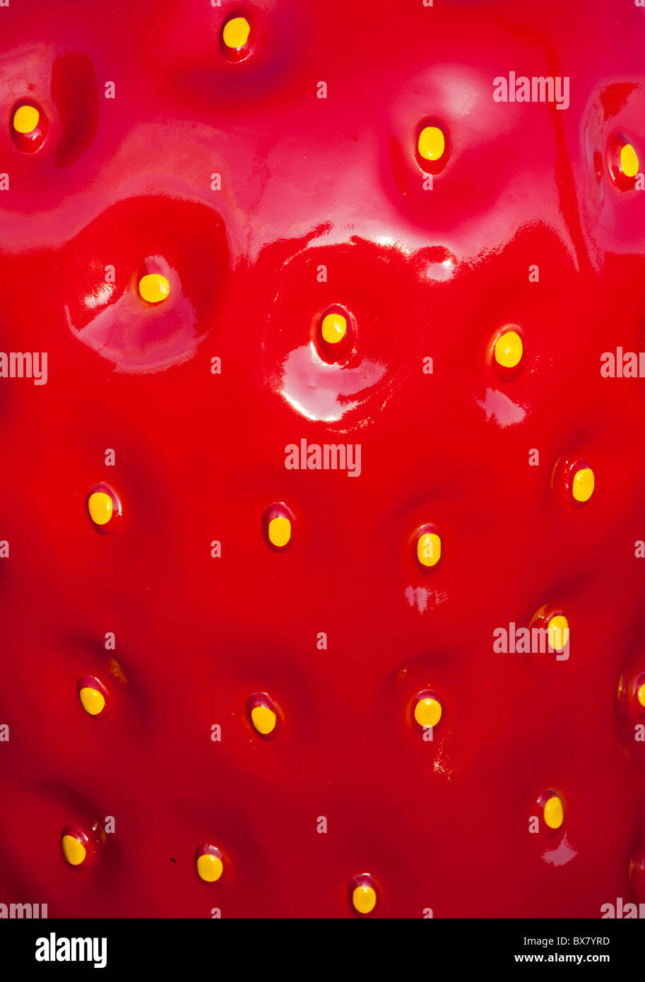Red bumpy surface with yellow dots Stock Photo - Alamy
