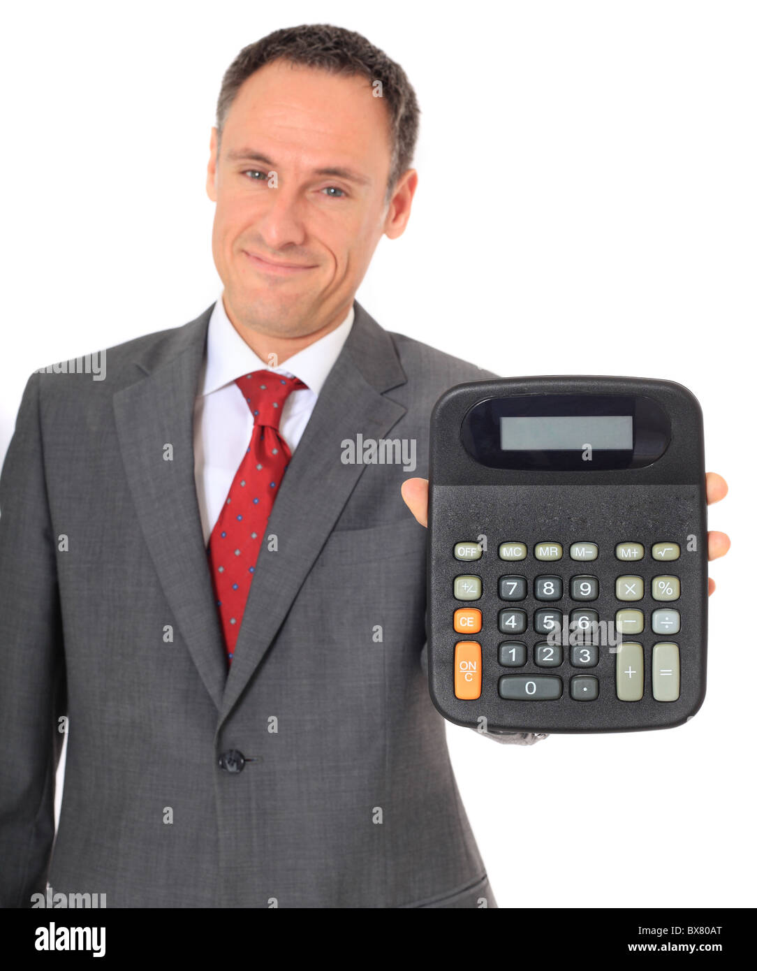Attractive businessman holding calculator. All on white background ...