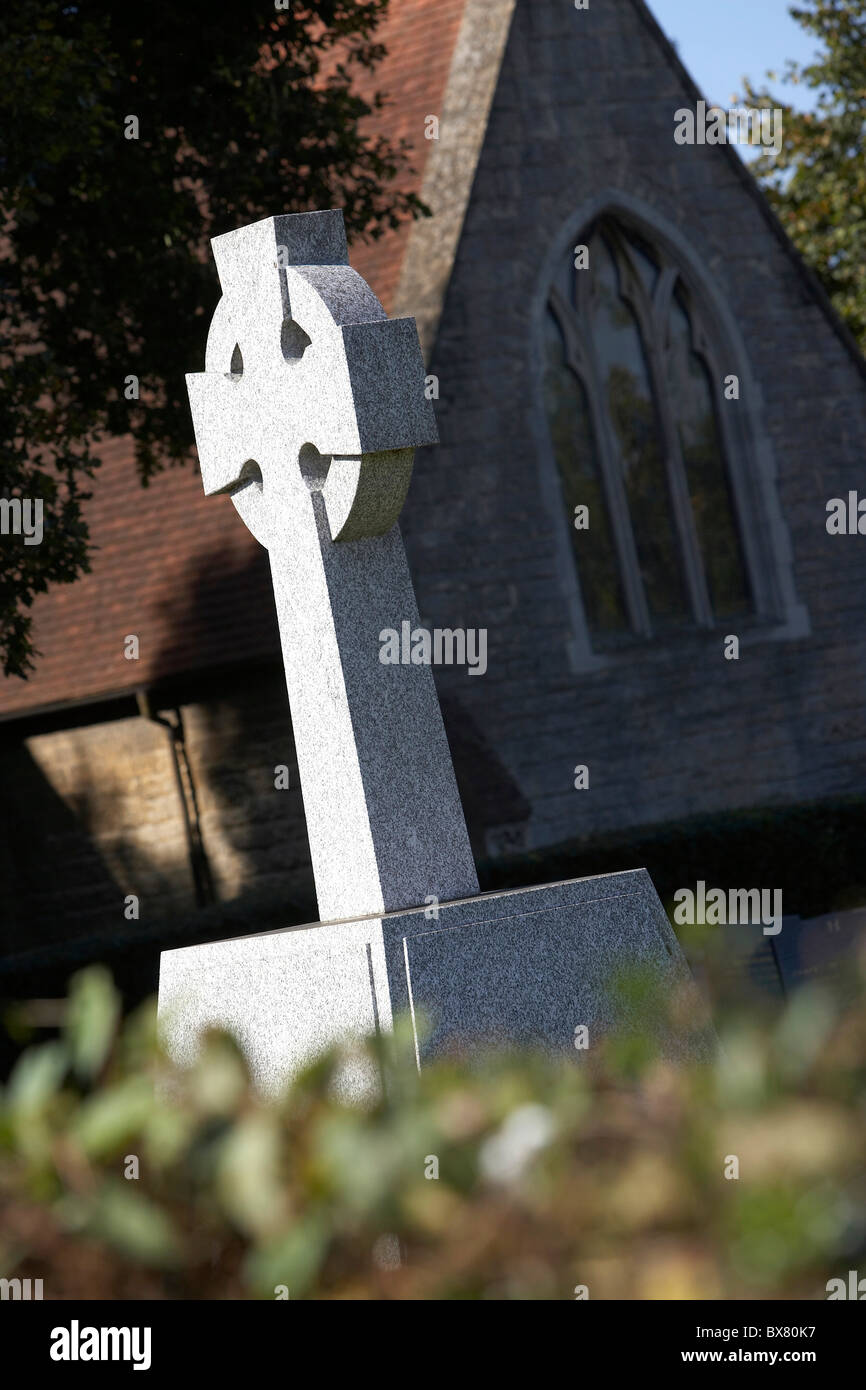 Stone cross in church yard UK Stock Photo - Alamy