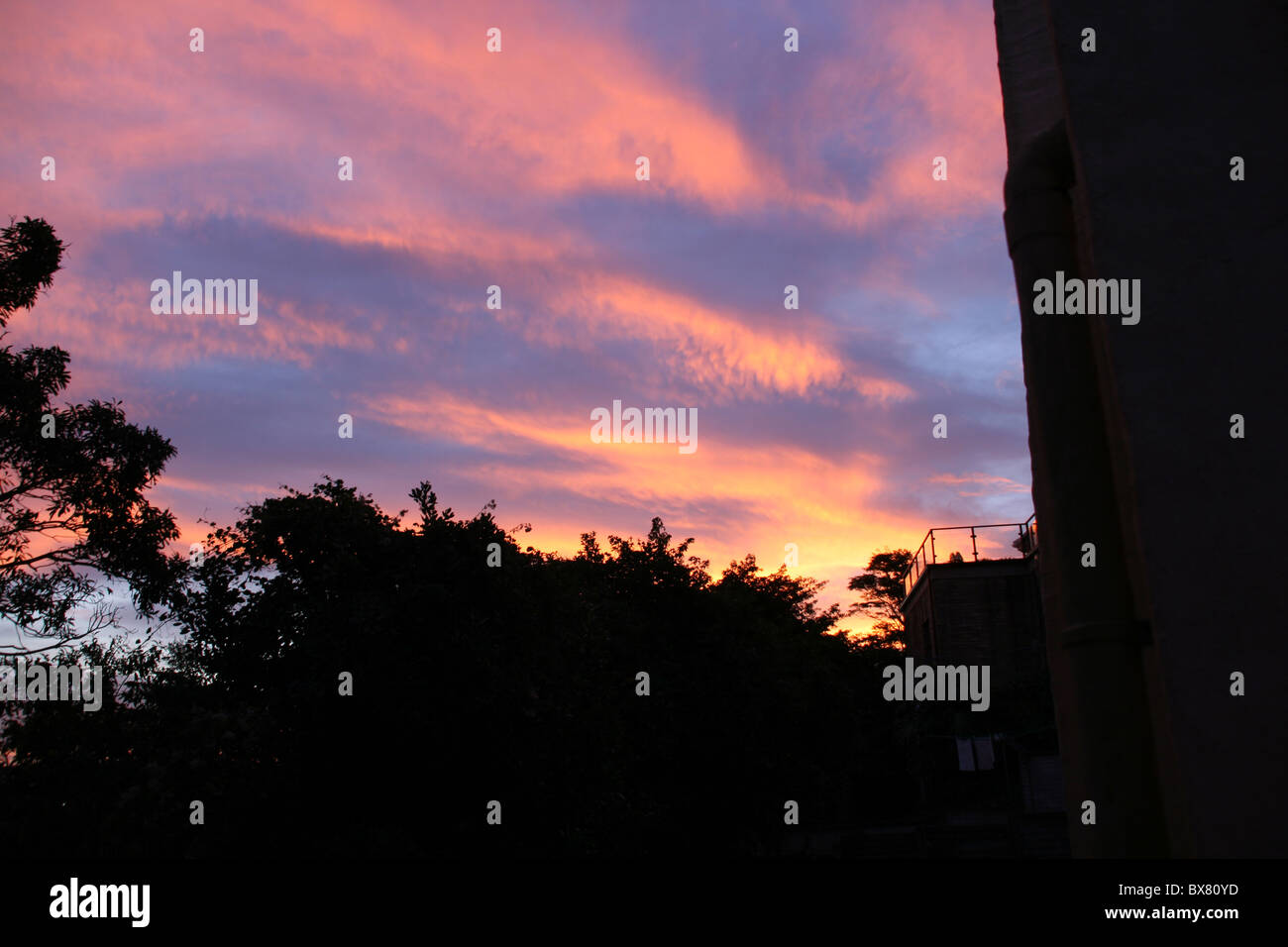 Sunset off the balcony Stock Photo - Alamy