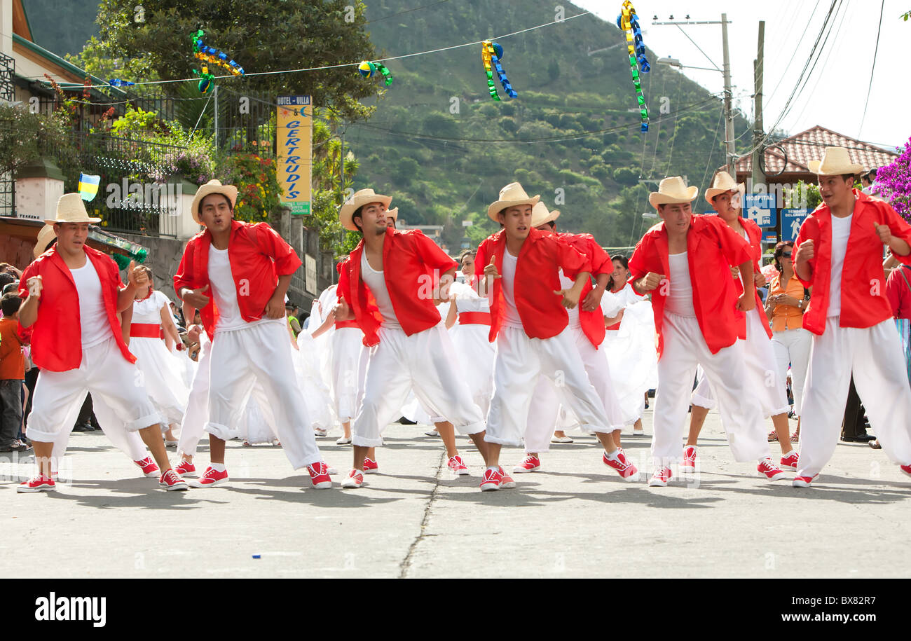 MAN DRESSED IN RED AND WHITE DANCING ON THE STREET BANOS CITY ...