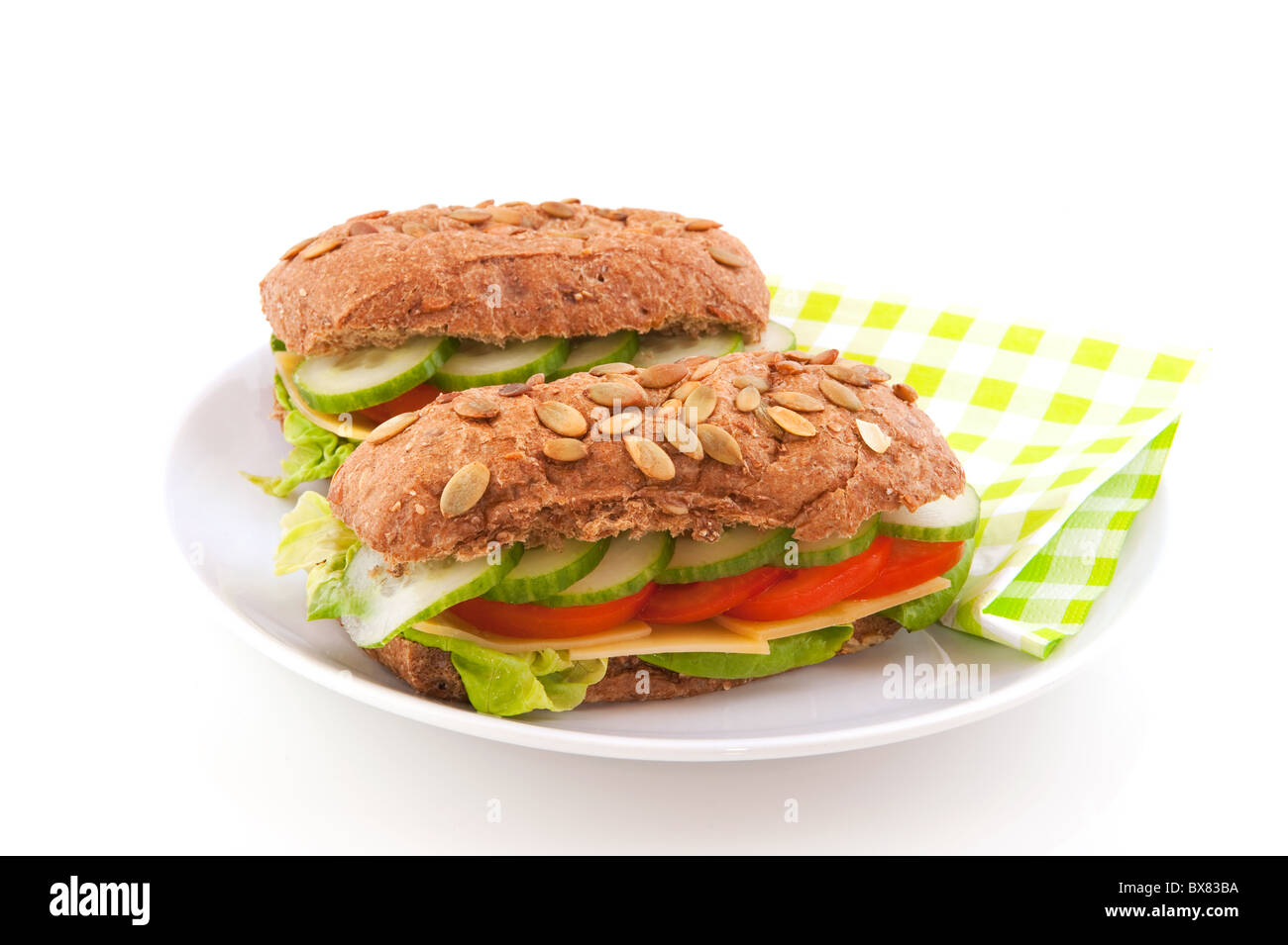 Healthy lunch with brown wholemeal bread rolls with cereals and ...