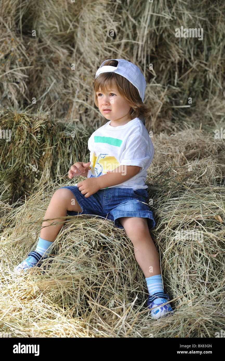 boy in the hay Stock Photo - Alamy