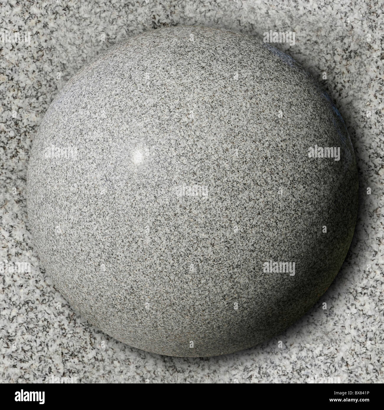 Stone sphere against polished granite surface Stock Photo - Alamy