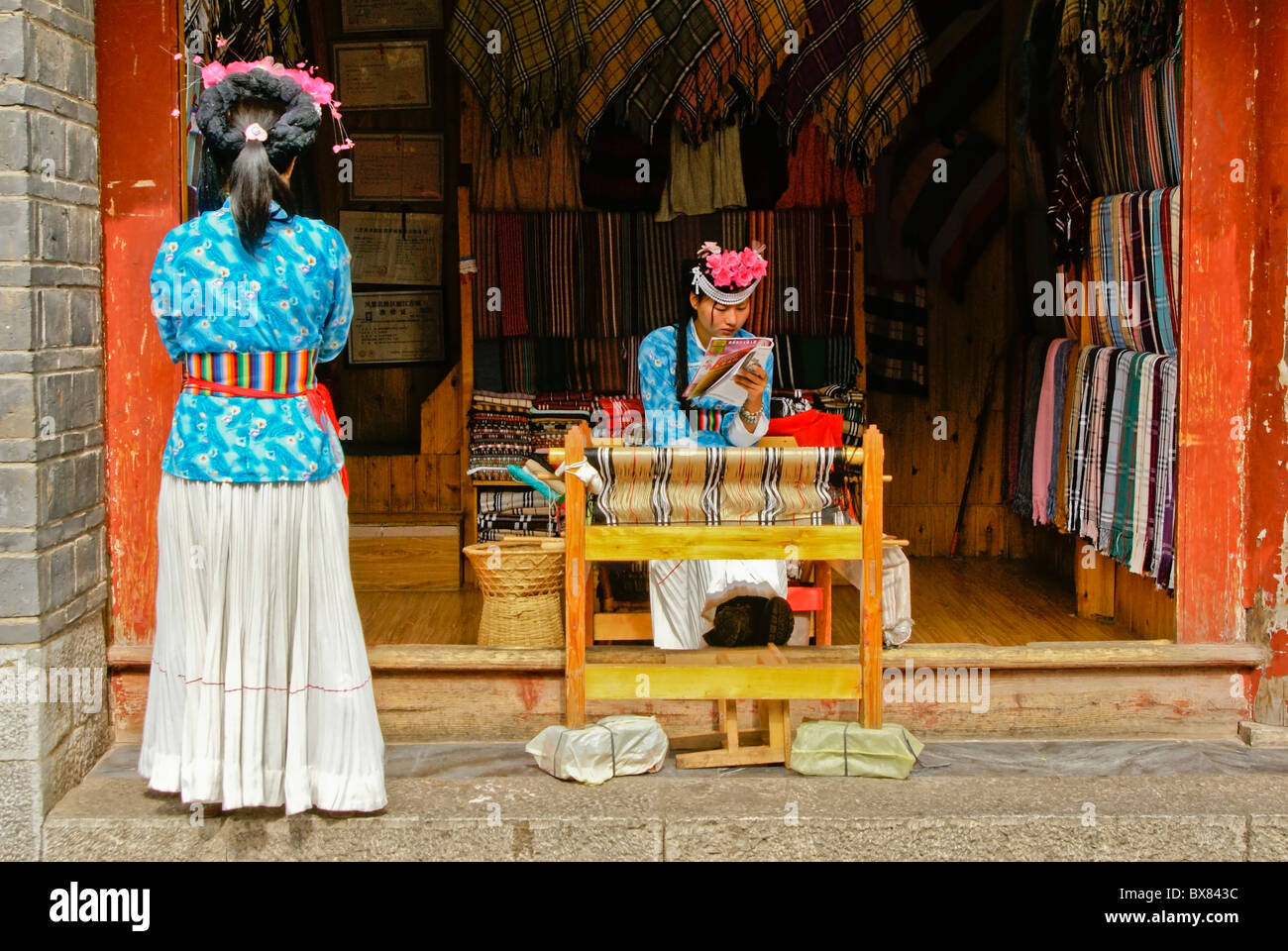 Mosuo women at textile shop, Lijiang, Yunnan, China Stock Photo - Alamy