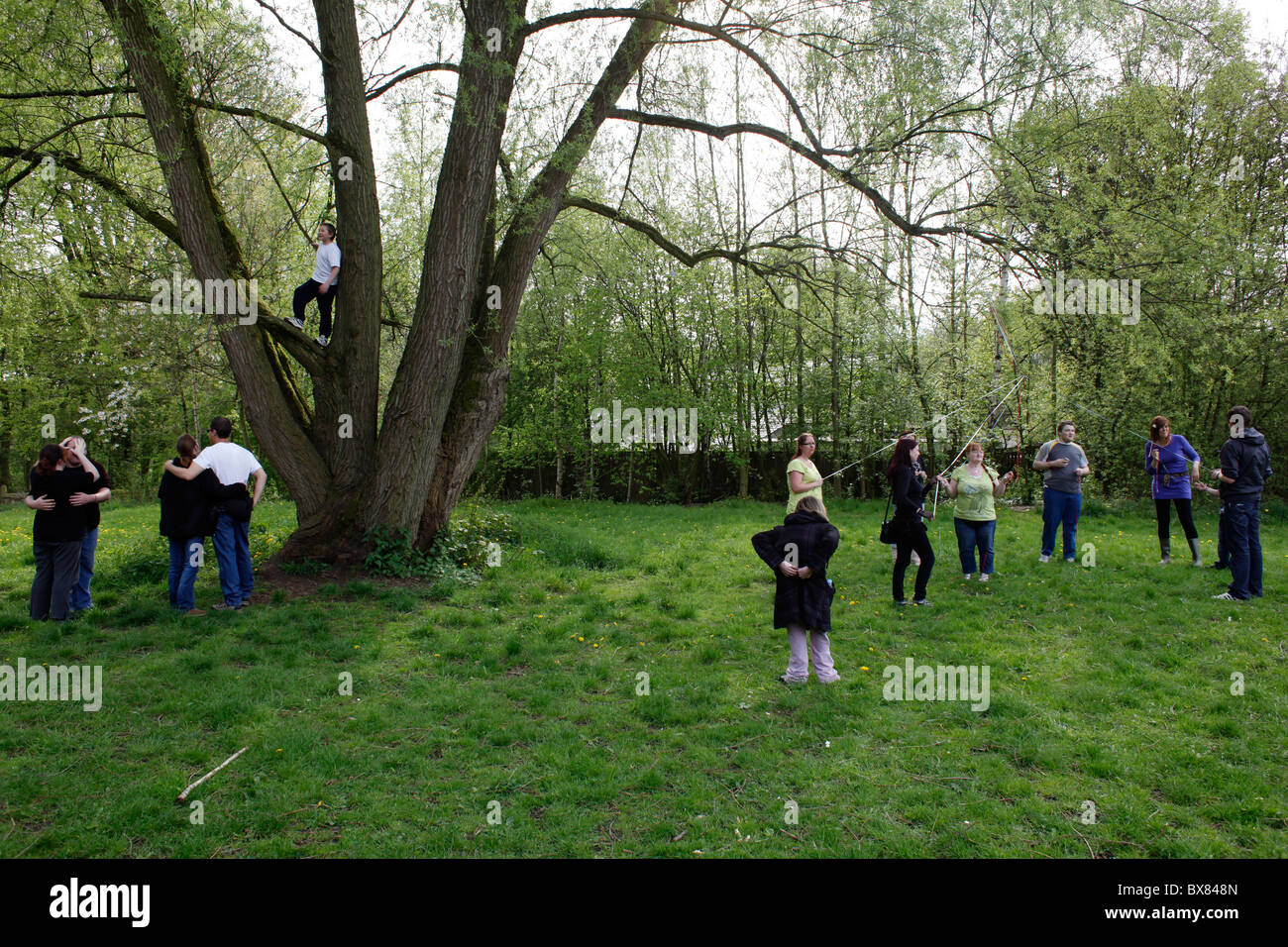 Pagans following the Wiccan path celebrate Beltane by dancing round a ...