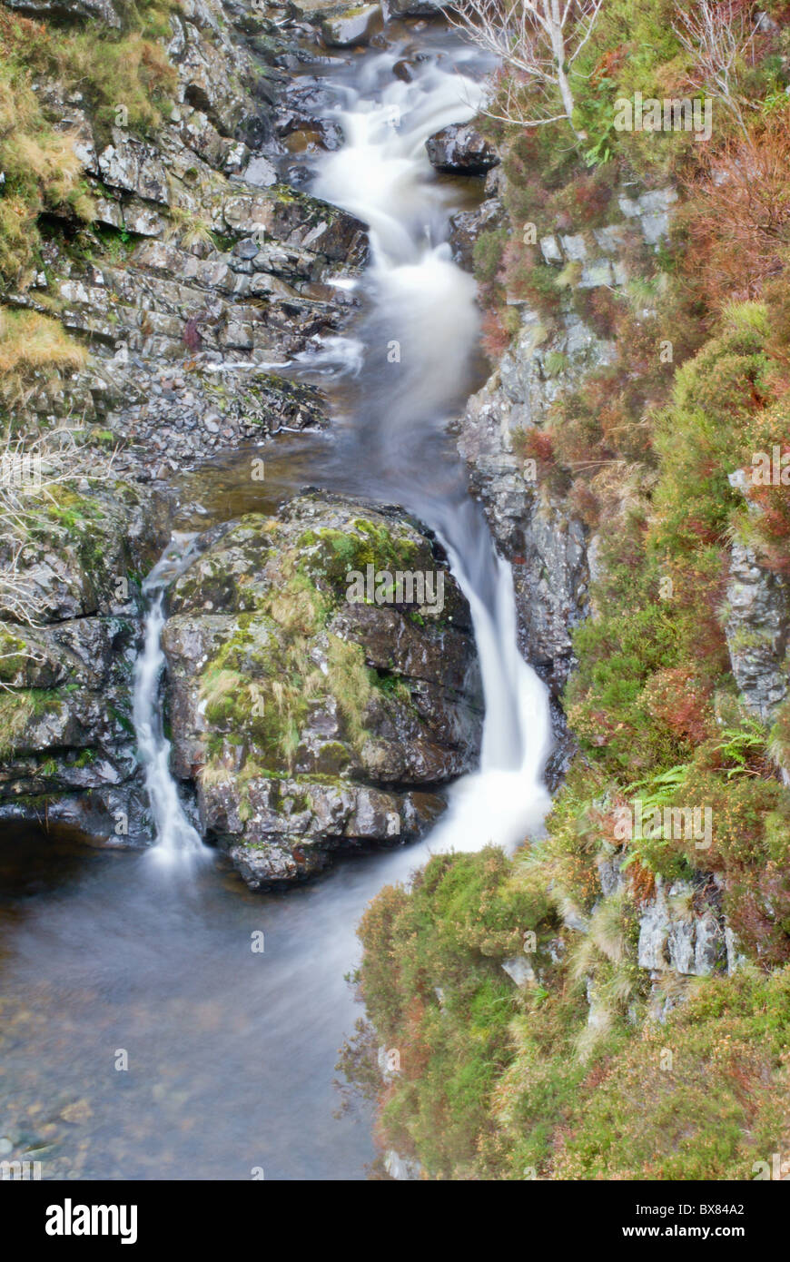 Smaller waterfall, part of the The Grey Mare's Tail at Loch Skene in ...