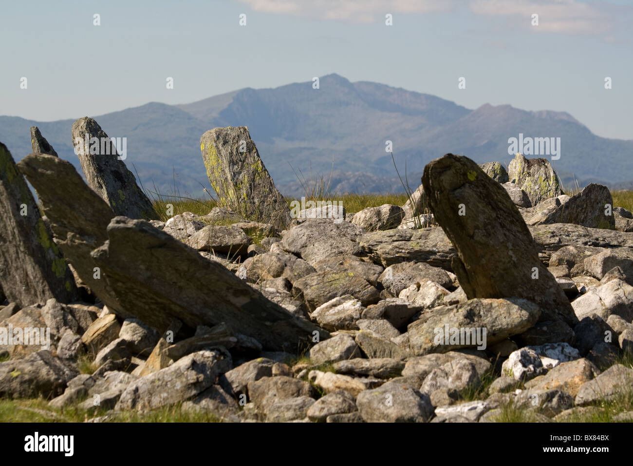 Snowdon rises beyond the ancient stone ring cairn of Bryn Cader Faner ...