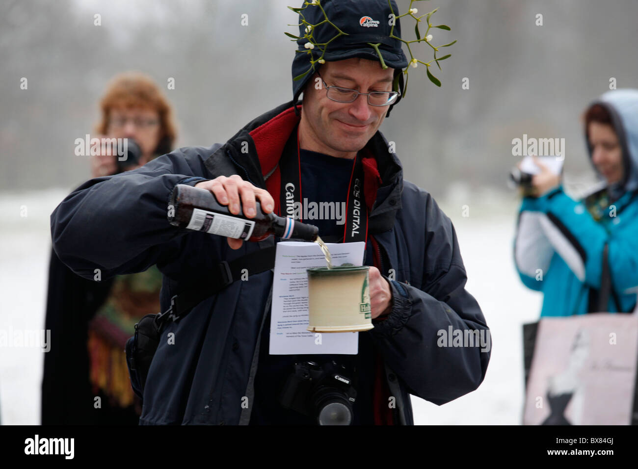 Druids use cider in a ritual to celebrate the power of mistletoe at the ...