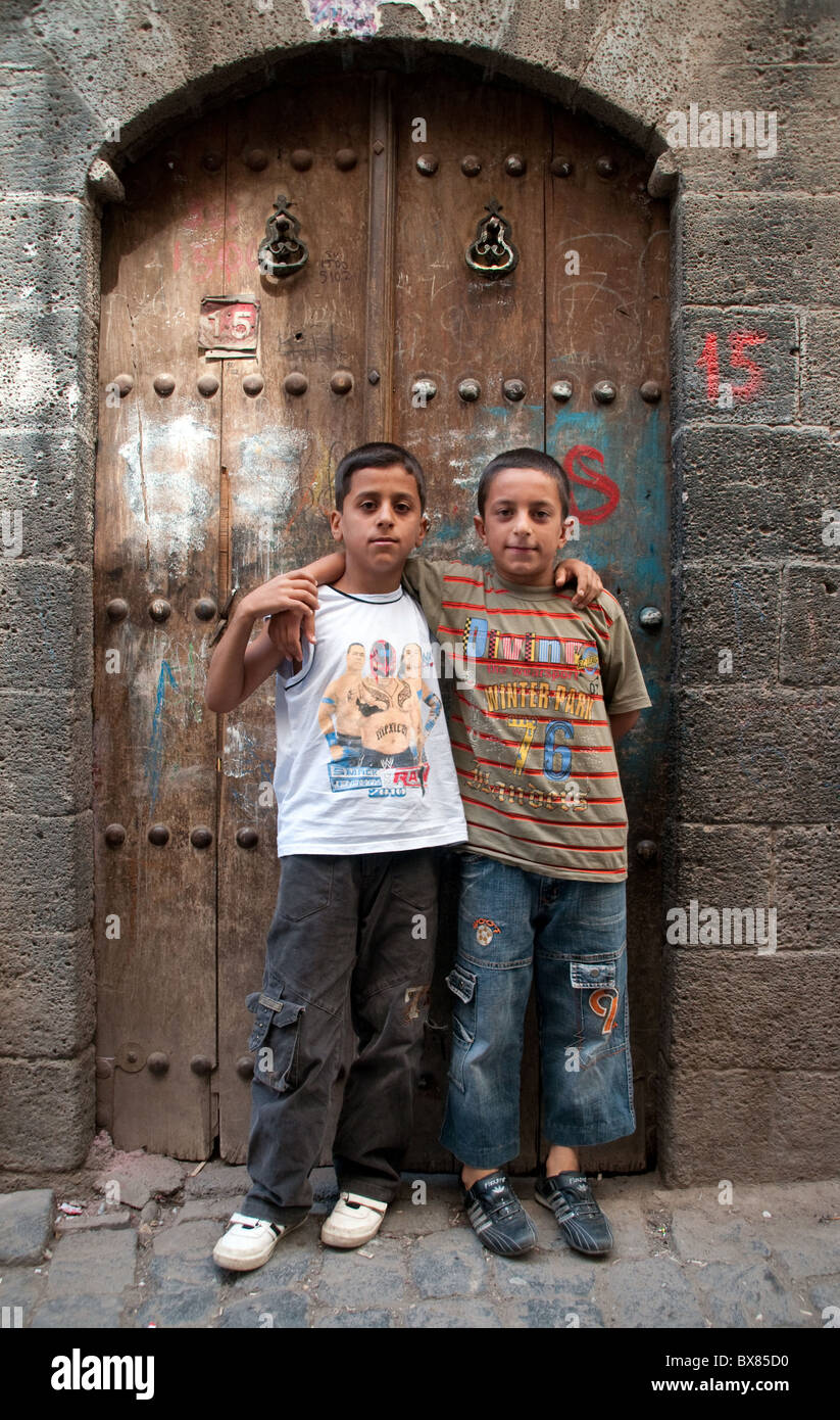 A portrait of two young Kurdish boys in the old city of Diyarbakir in ...