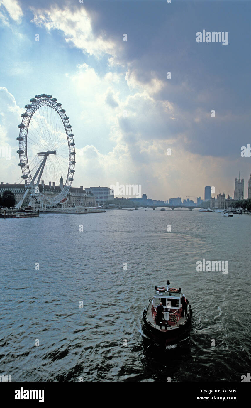 The contrasting weather conditions help to highlight the London Eye ...