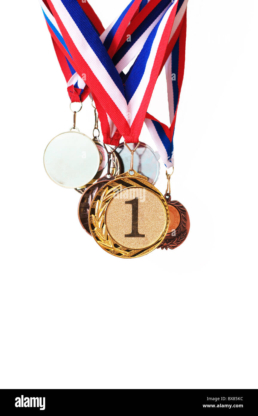 Collection of sports medals on a wall on a white background Stock Photo ...