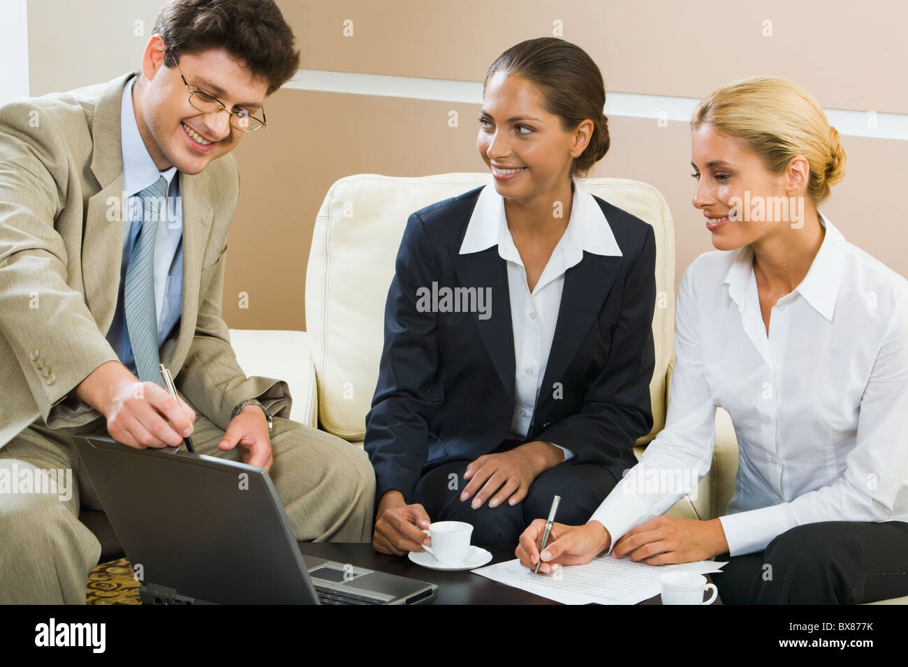 Boss is explaining the correct way of analysis to his people in working ...