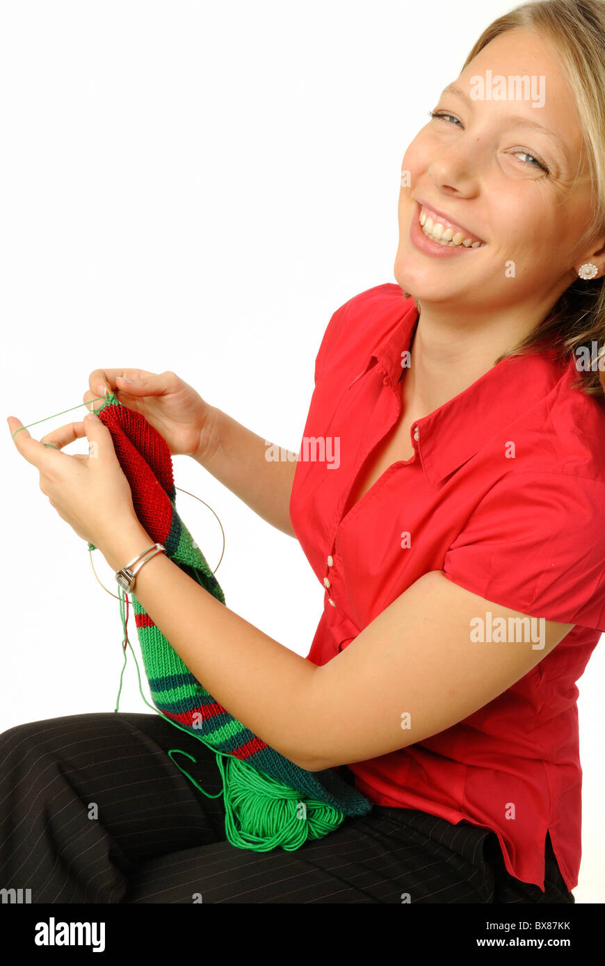 Young woman knitting Stock Photo - Alamy