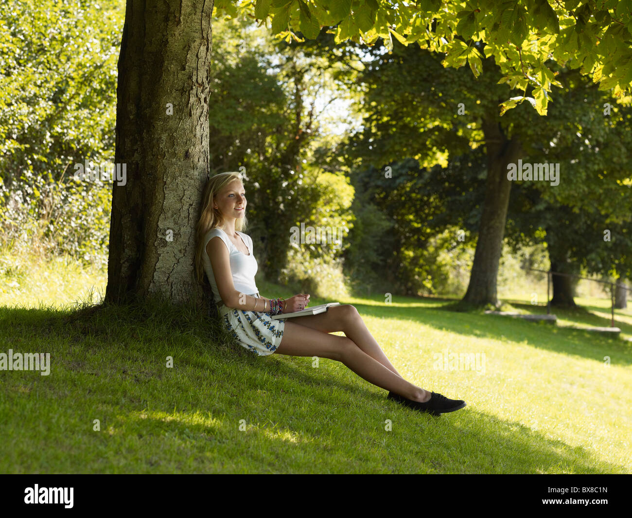 Sitting Under A Tree High Resolution Stock Photography and Images - Alamy