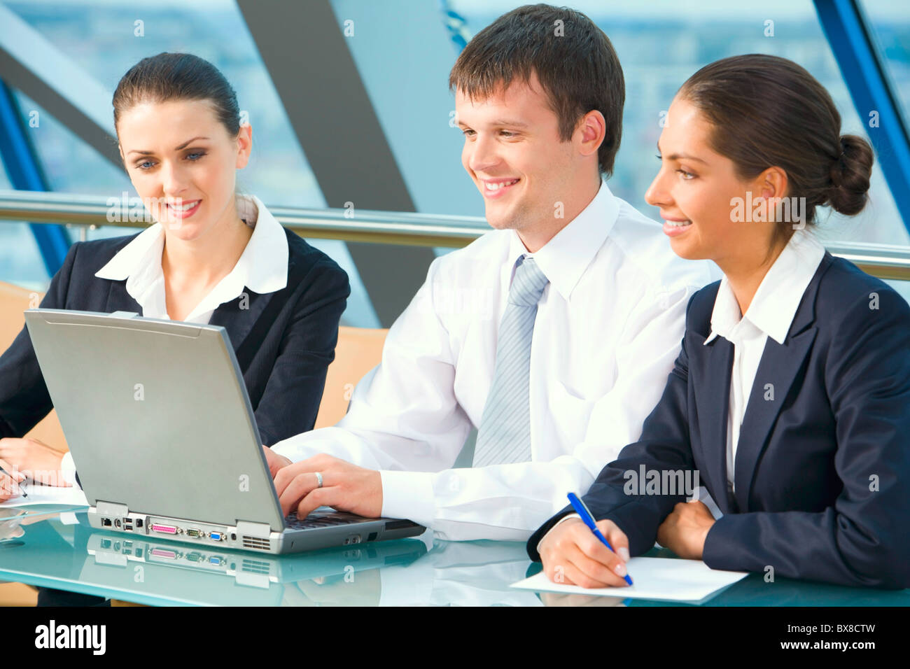Group friends gathered around table hi-res stock photography and images ...