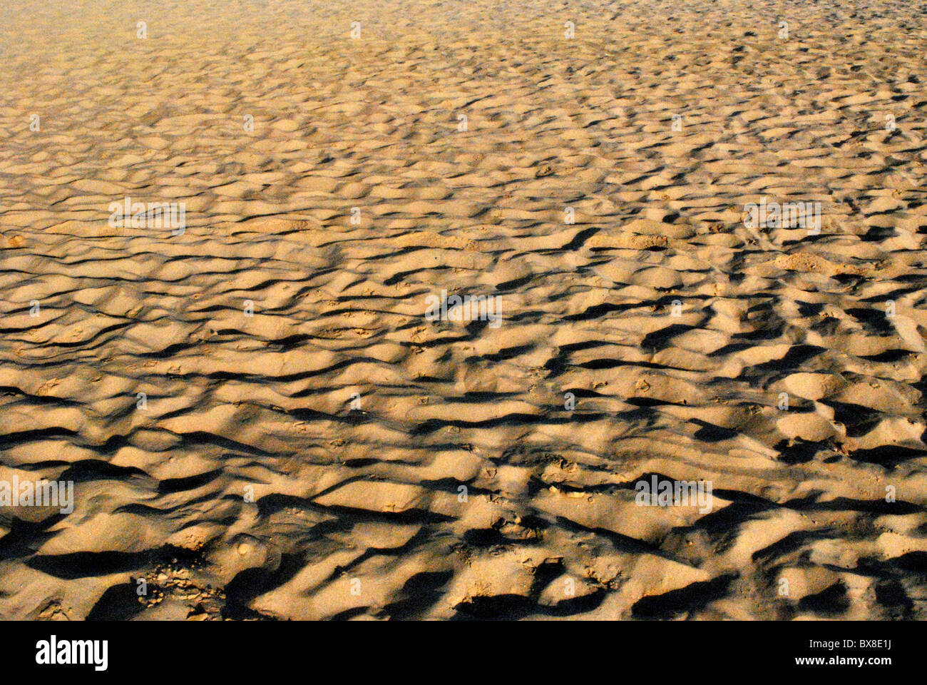 sea sand with footprints and feet Stock Photo - Alamy