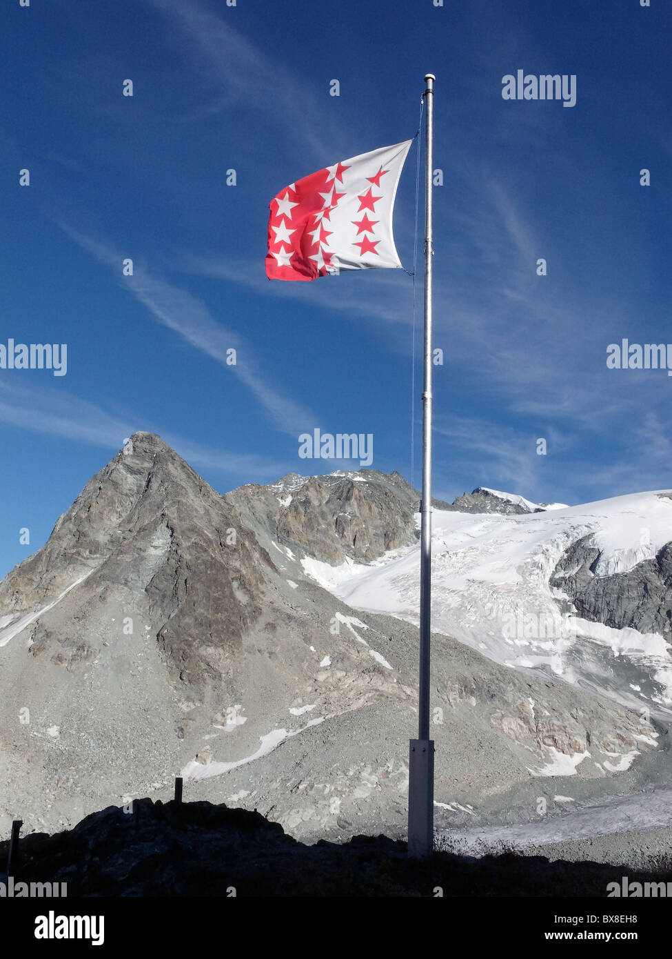 The Swiss Canton of Valais flag flying at the Dix hut , near Arolla ...
