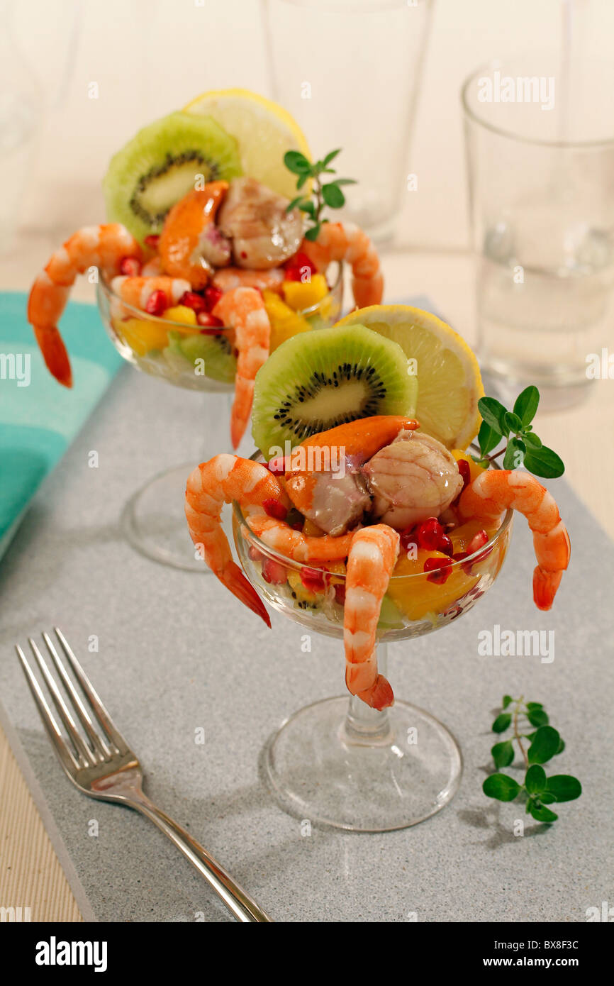 Tropical cocktail with shellfish. Recipe available Stock Photo - Alamy