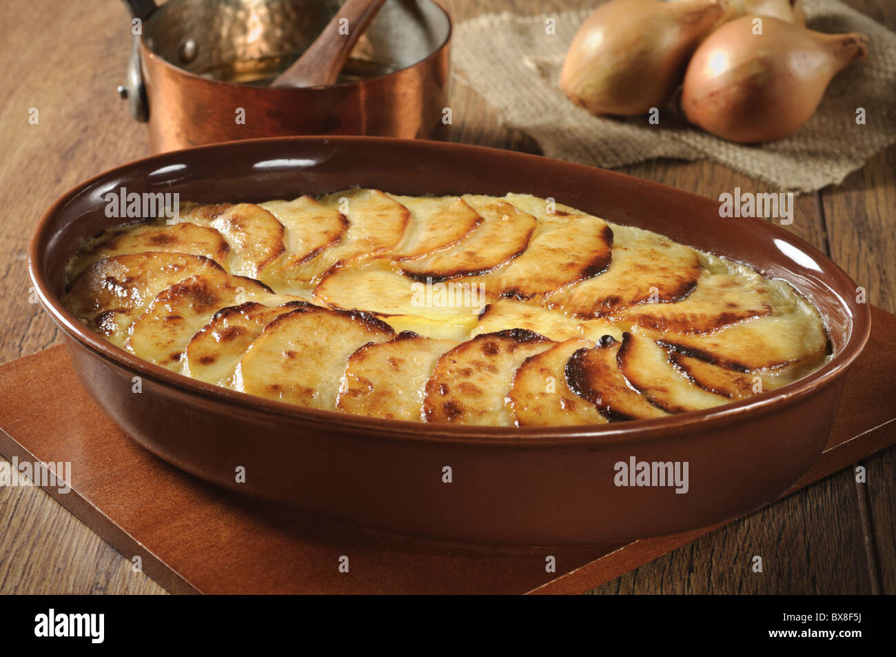 Boulangere potatoes hi-res stock photography and images - Alamy
