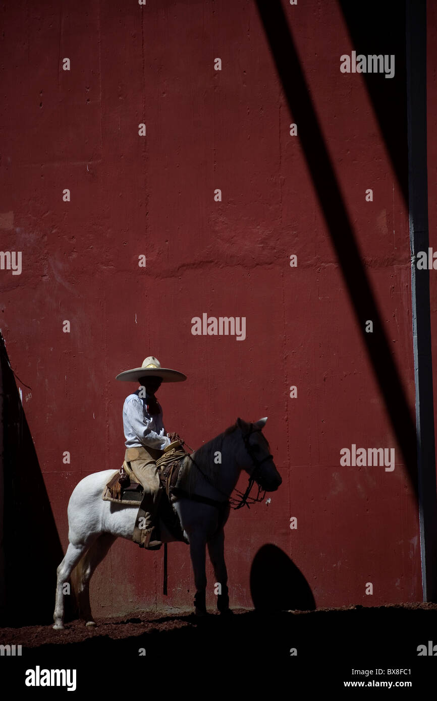 A Mexican charro ride his horse at the National Charro Championship in ...