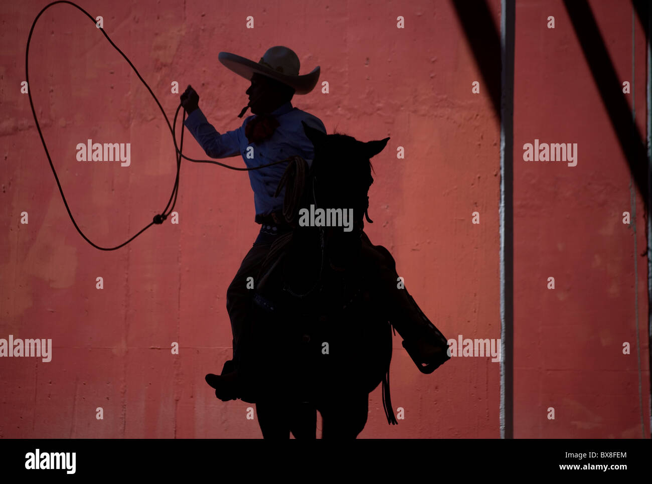 A Mexican charro practices his lasso at the National Charro ...