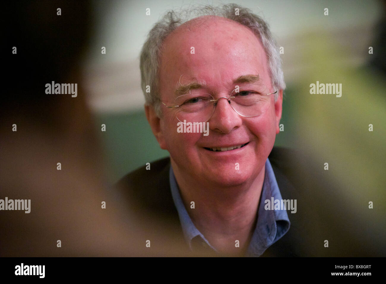 British author Philip Pullman autographs his new novel, "The Good Man ...