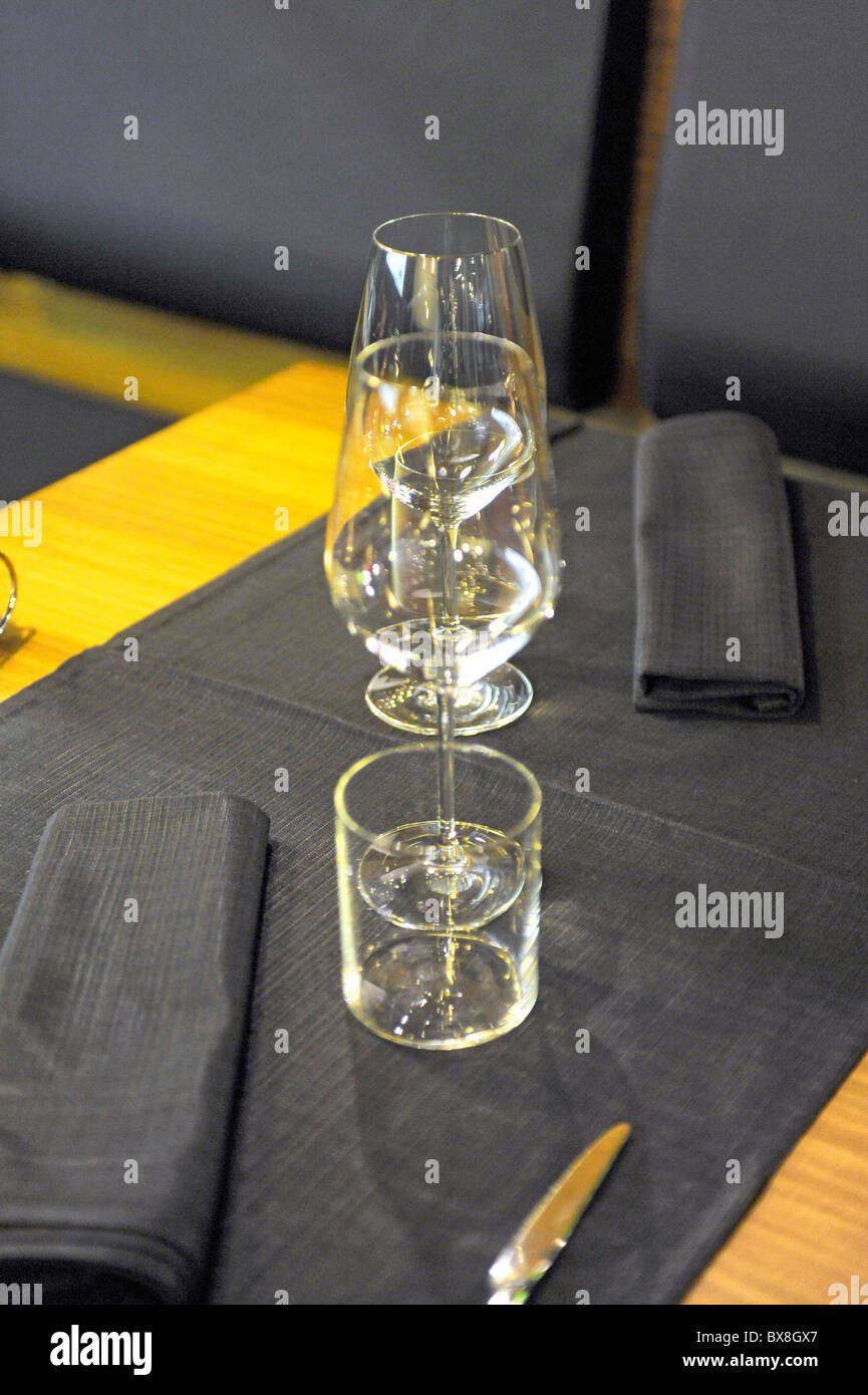 dining room with glass tableware and serving dishes Stock Photo - Alamy