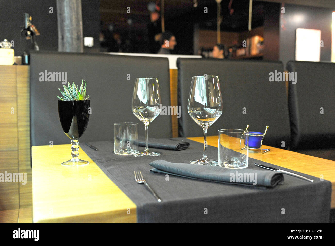 dining room with glass tableware and serving dishes Stock Photo - Alamy