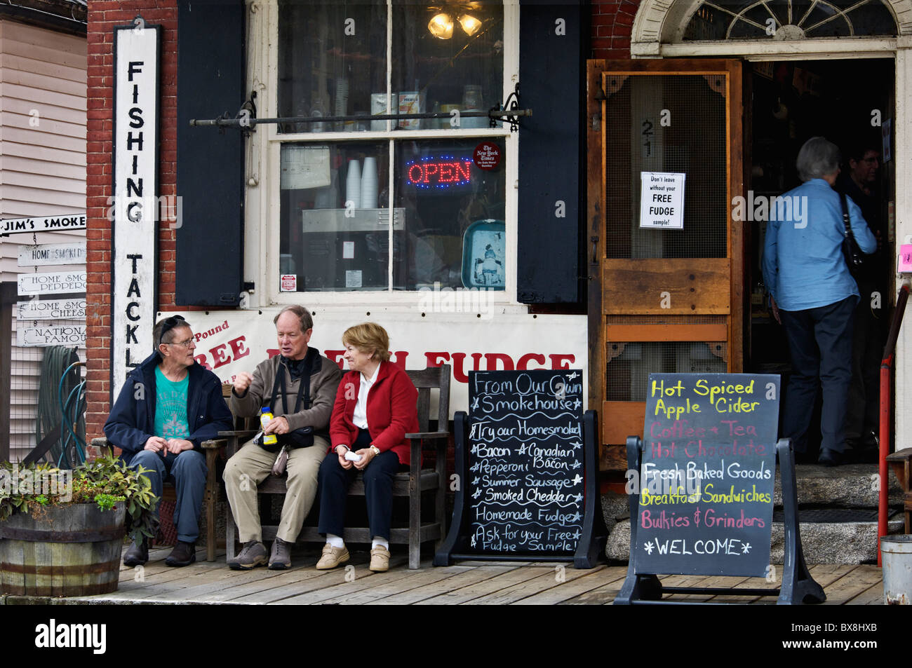 Tourists Relaxing on the Front Porch of the Brick Store in Bath, New ...