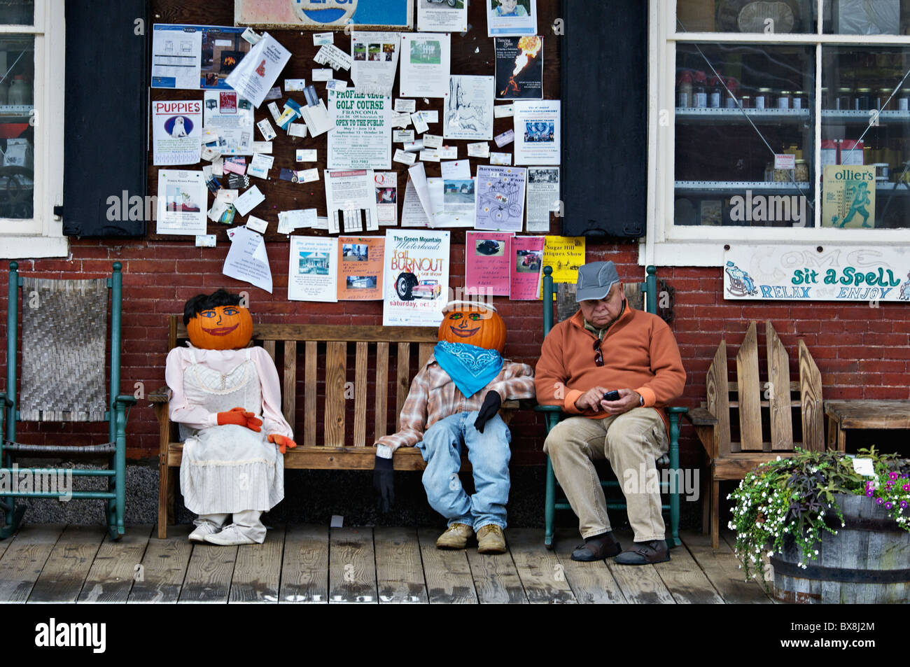 Tourists Relaxing on the Front Porch of the Brick Store in Bath, New ...