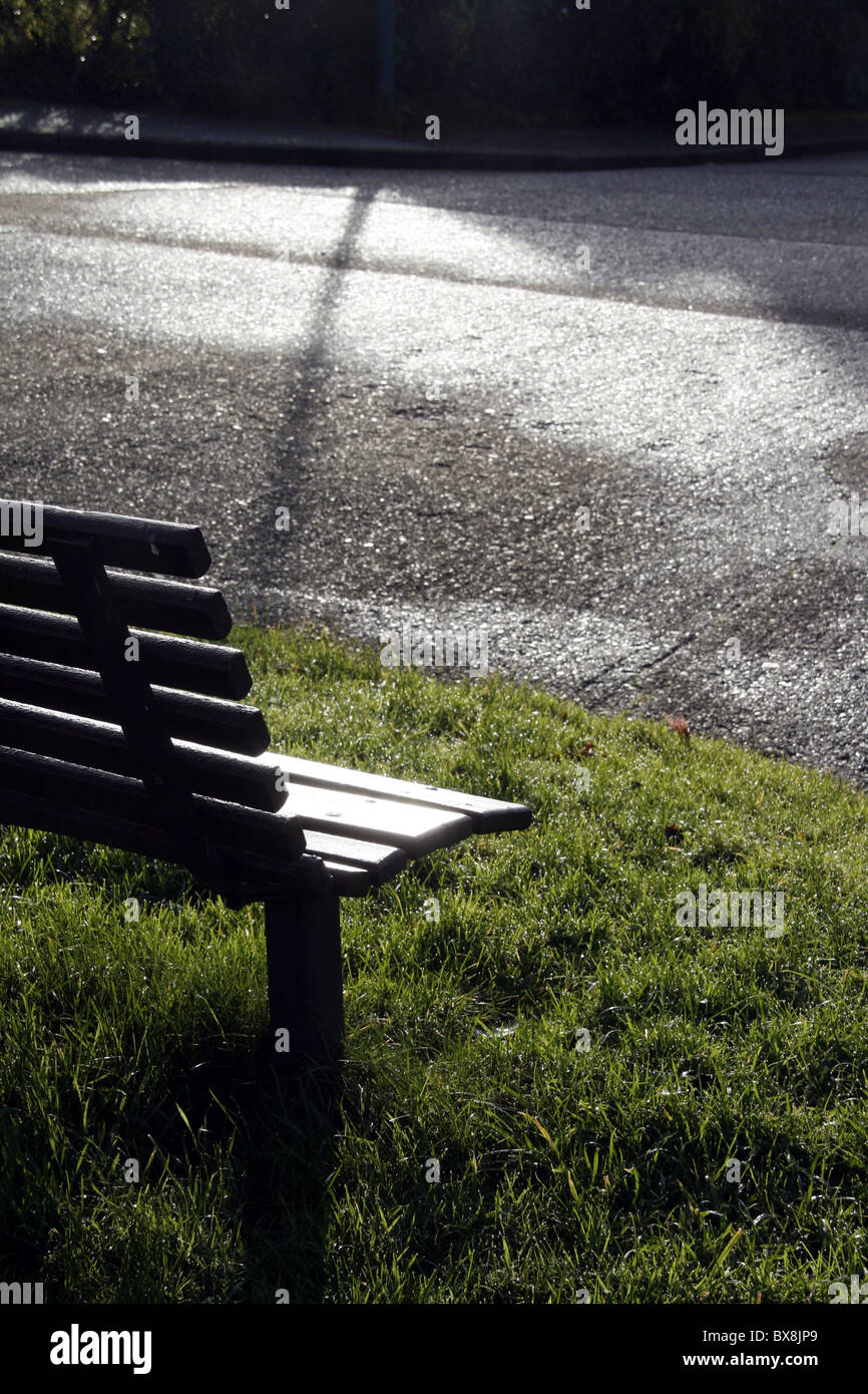 one empty bench by street road Stock Photo - Alamy