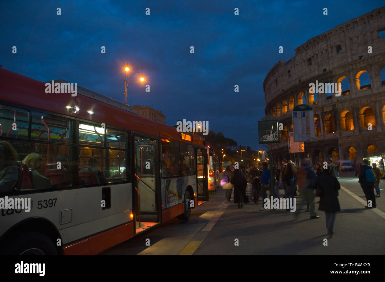 Bus stop outside the Colosseum in dark central Rome Italy Europe Stock ...