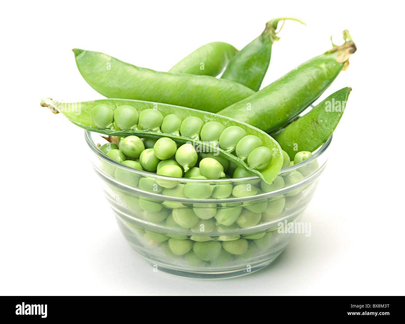 Vegetable peas in glass dishware Stock Photo - Alamy