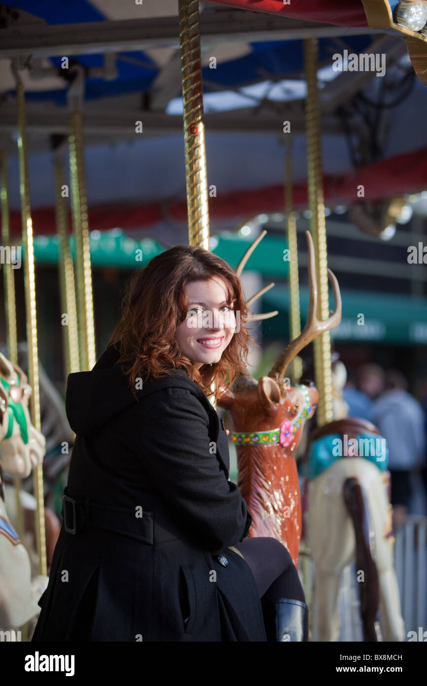 Woman carousel hi-res stock photography and images - Alamy