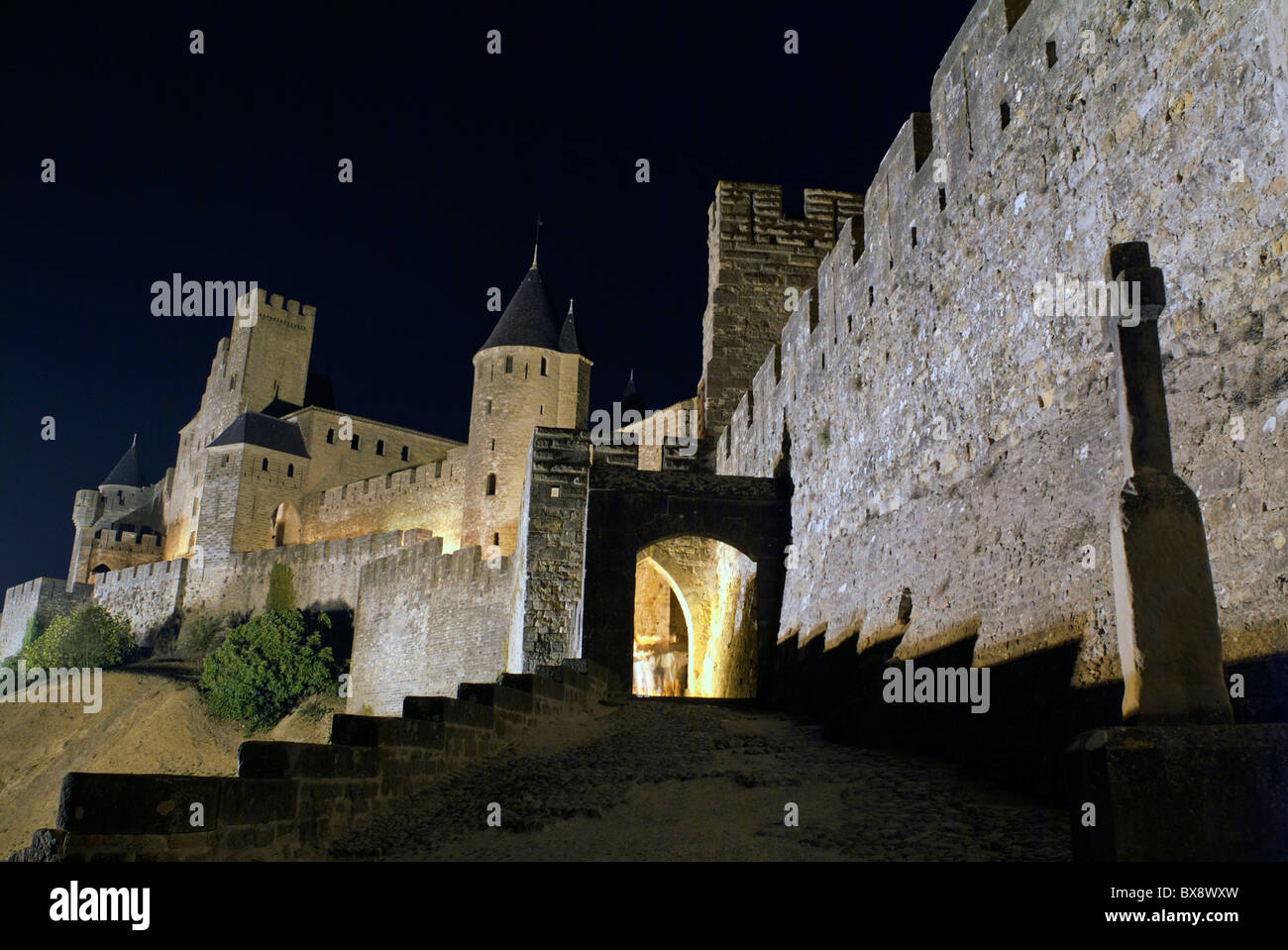 Walls of the medieval city at night, Carcassonne, France Stock Photo ...