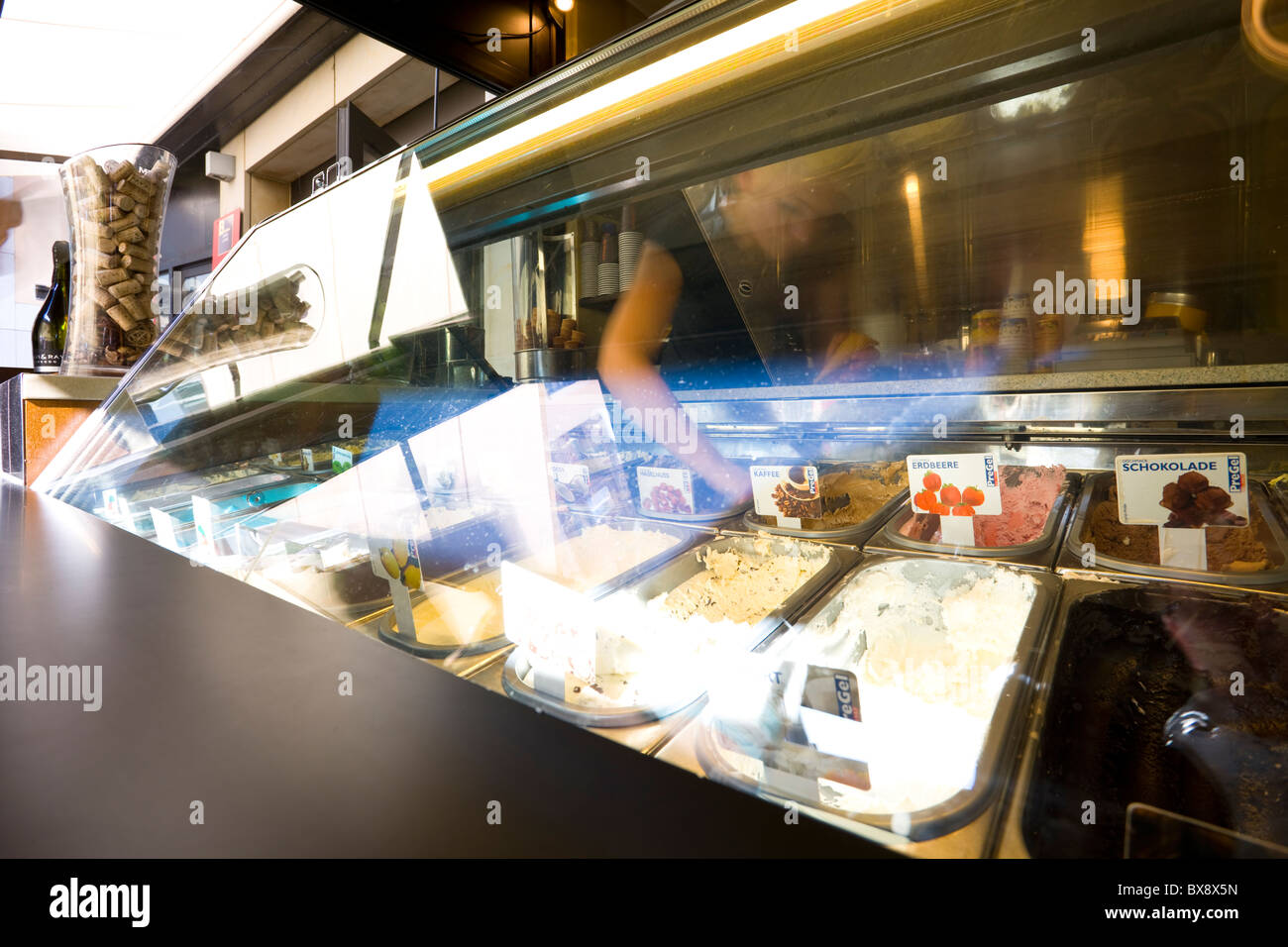 Woman selling ice cream in ice cream shop Stock Photo - Alamy