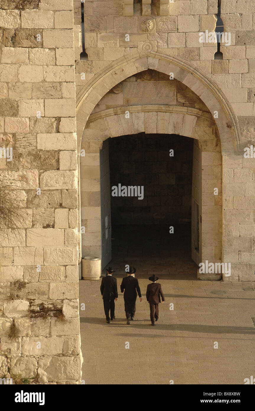 Ultra orthodox Jews walk through Jaffa Gate or Bab al-Khalil one of ...