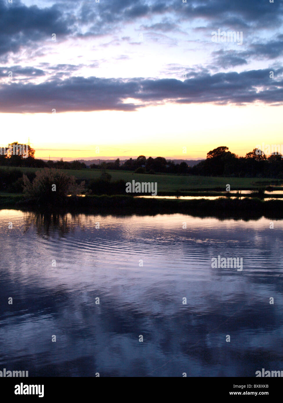 Sunset reflection on lake hi-res stock photography and images - Alamy