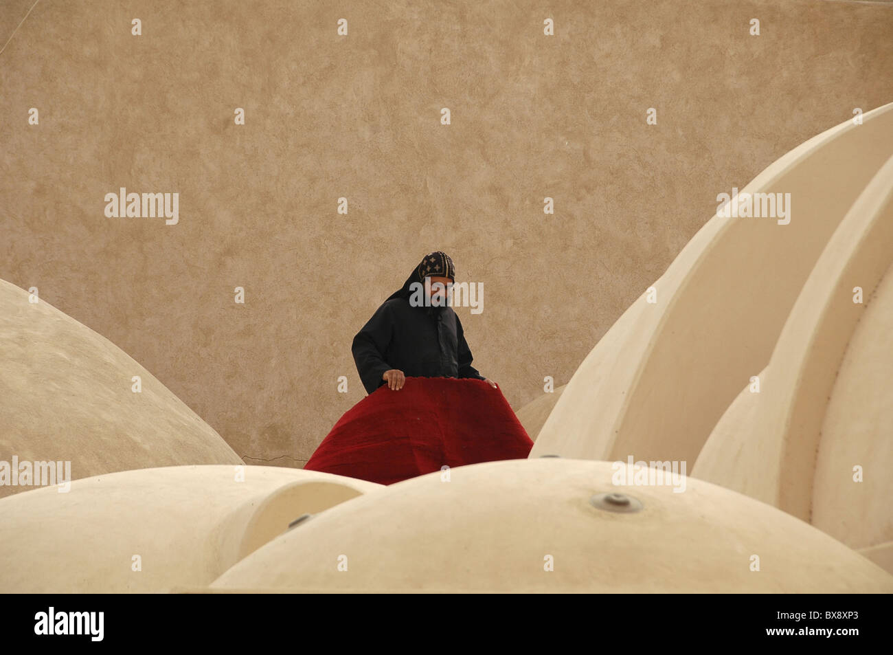 A Cop[tic priest on the rooftop of the Coptic orthodox monastery Syrian ...