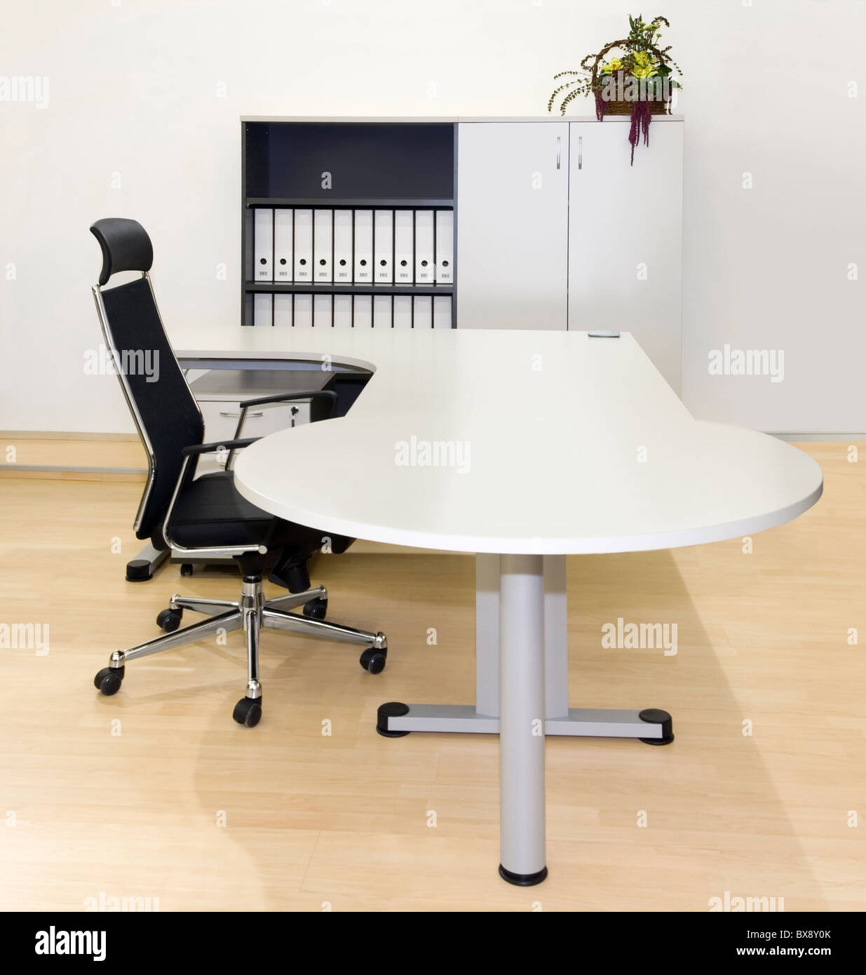 Simple workplace in modern office Stock Photo - Alamy