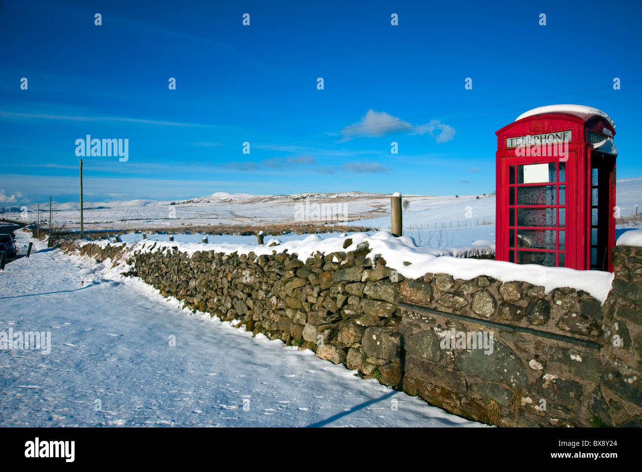 Phone box in the snow Stock Photo - Alamy