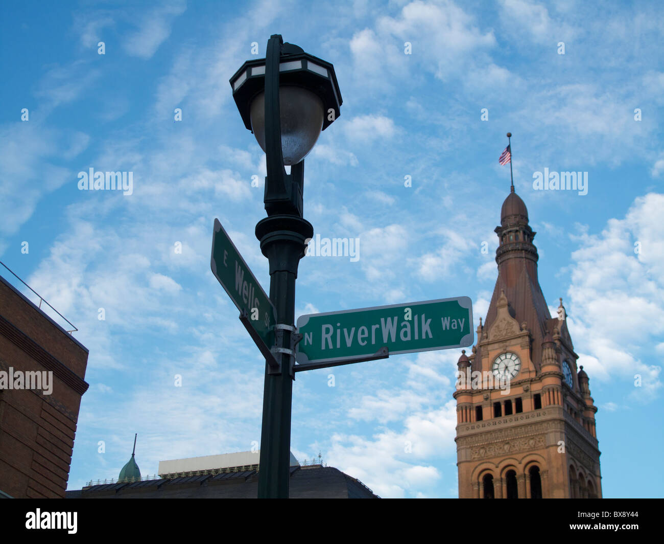 Street lamp and street signs. Intersection of Wells Street and River ...