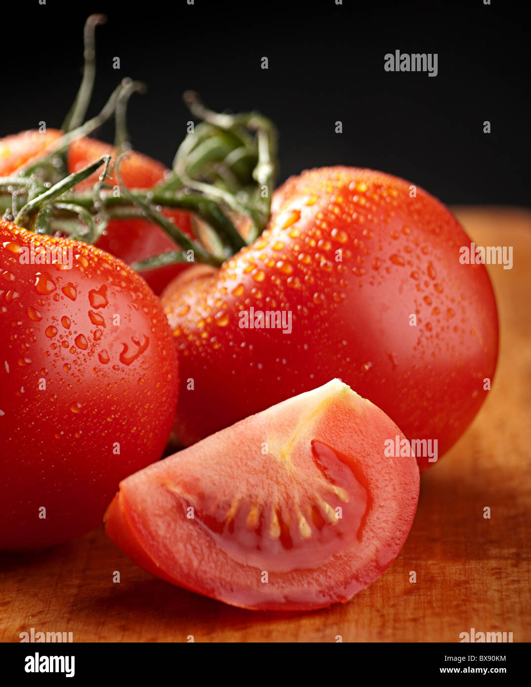 Red tomato in water drop Stock Photo - Alamy