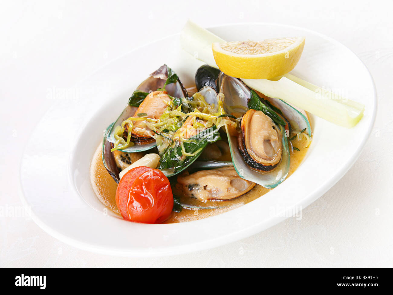 Mussel with shell and vegetable Stock Photo - Alamy
